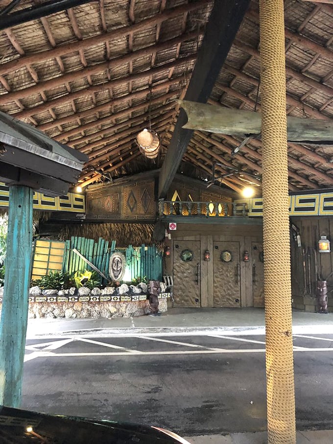 The entrance feels like discovering a secret tropical village. This isn't just architecture—it's storytelling with bamboo and thatch.