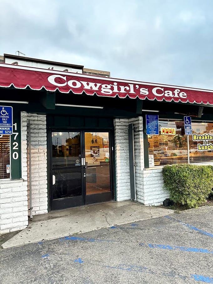 The entrance to breakfast paradise – where the red awning serves as a beacon to those seeking refuge from mediocre morning meals.
