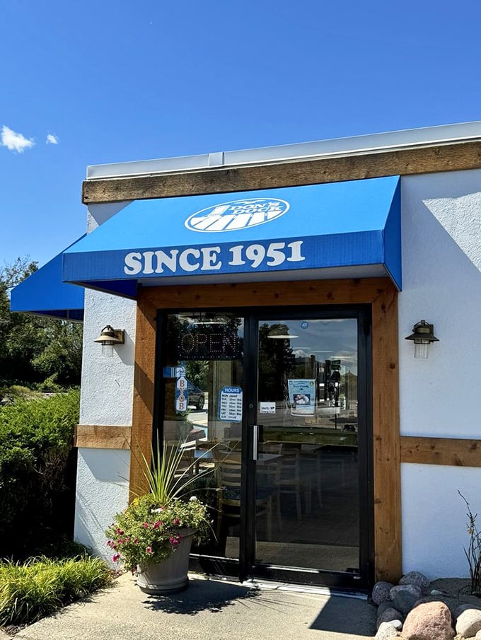 The blue awning proudly declares "SINCE 1951"—because when you've been doing something right for over 70 years, you've earned the right to brag a little.
