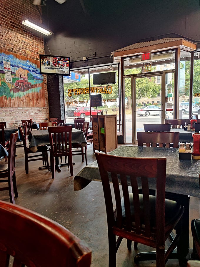The dining room's simple elegance—wooden chairs, blue tablecloths, and brick walls—lets the food remain the undisputed star of the show.