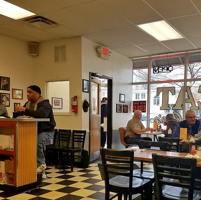 The dining room during service—where strangers become temporary neighbors united by the universal language of good food.