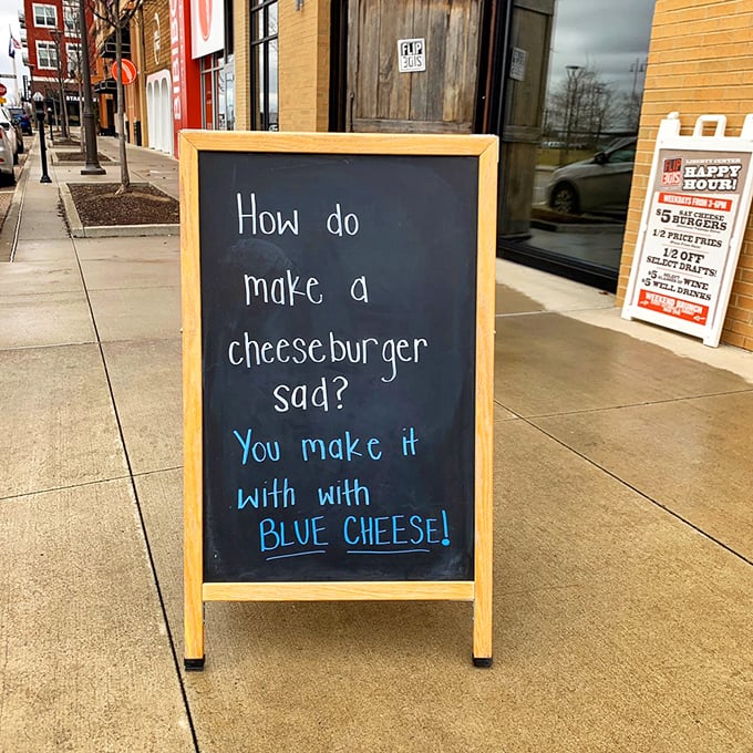 "How do you make a cheeseburger sad? You make it with BLUE CHEESE!" Dad jokes and burger wisdom—the sidewalk sign that keeps on giving.