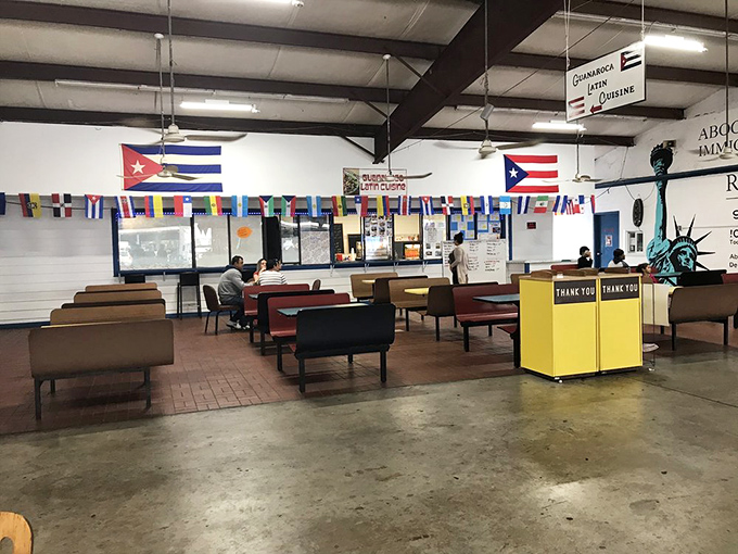 The international food court—where Cuban and Puerto Rican flags hang proudly, and the aroma of Caribbean spices makes decision-making deliciously difficult.