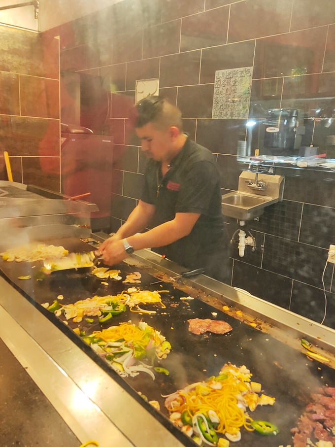 The hibachi chef transforms simple ingredients into sizzling masterpieces—dinner and a show where your taste buds get front-row seats.