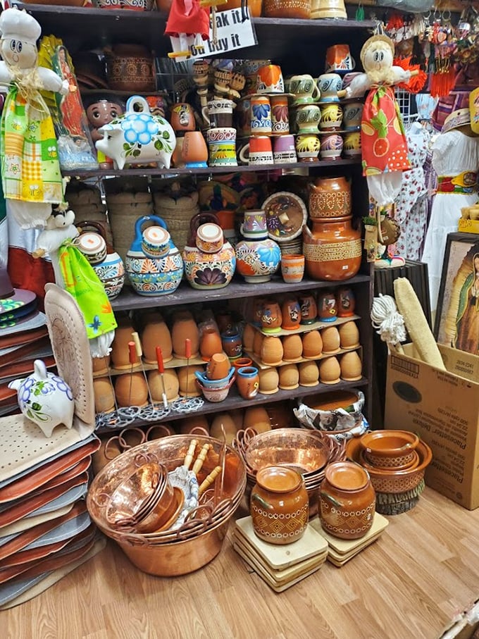 Pottery and handcrafted vessels stacked with the casual precision of someone who knows their wares will find the right home eventually.