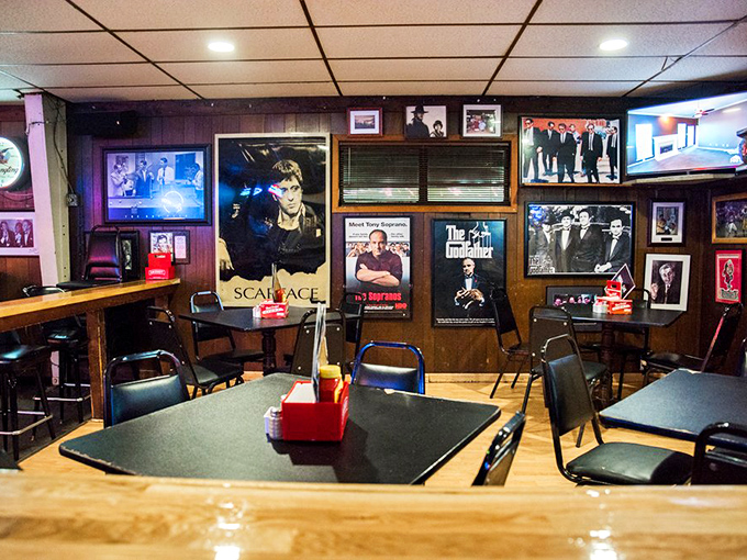 Classic films watch over diners like old friends. This corner feels like stepping into that neighborhood Italian joint from every great mobster movie.