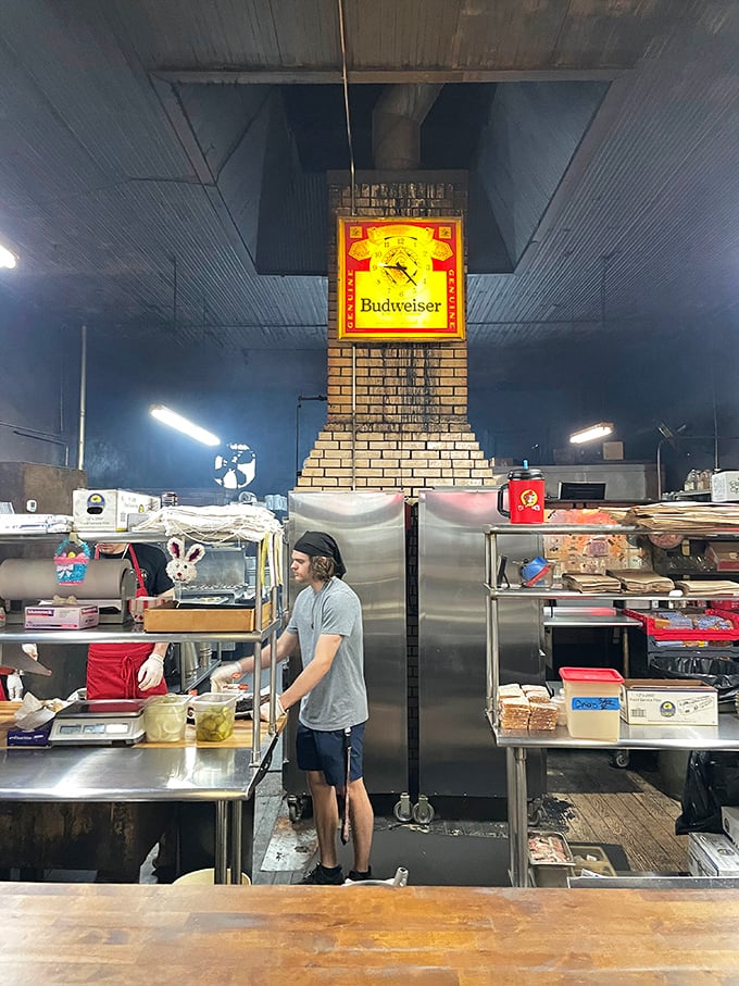 Behind the scenes where smoke and patience transform tough cuts into tender treasures. The magic happens in plain sight.