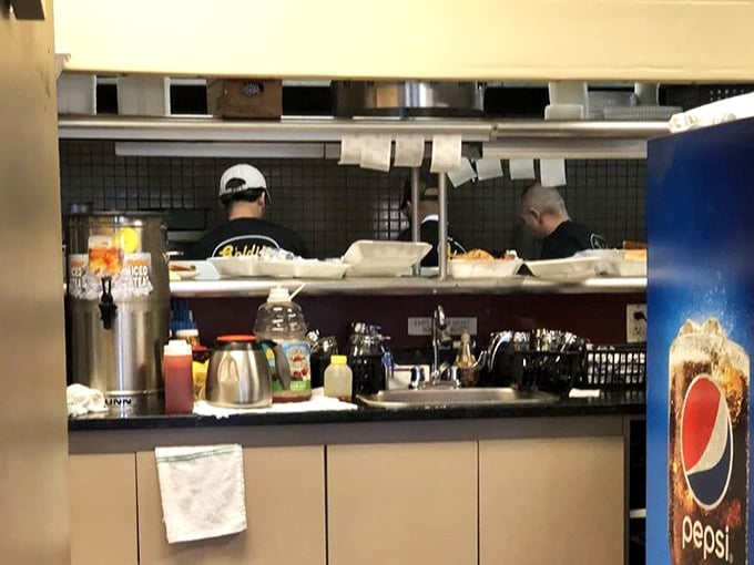A glimpse into the kitchen where breakfast magic happens—no smoke and mirrors, just skilled hands and well-seasoned equipment.