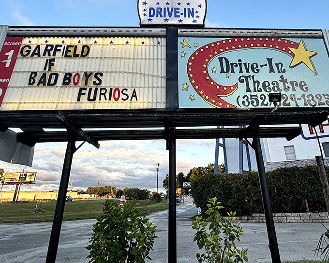 The marquee announces tonight's features with the same excitement as it has for decades—no algorithm suggested these films, just good old-fashioned movie magic.