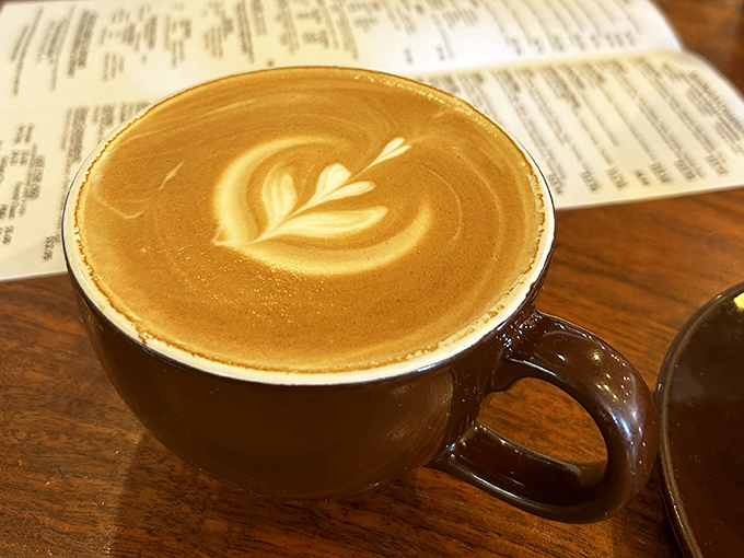 Latte art isn't just for show—it's the barista's signature, promising that what's beneath the foam was crafted with equal care.