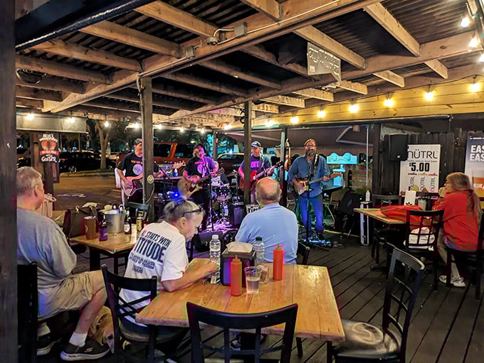 Live music under string lights creates the kind of evening that reminds you why Florida nights beat streaming services every time.
