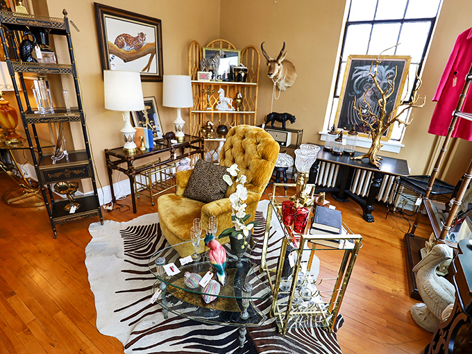This glamorous corner marries mid-century and Hollywood Regency styles with gold accents that would make Liberace nod in approval.