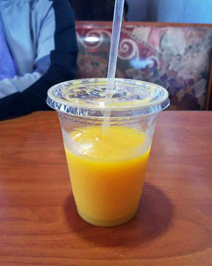 Fresh orange juice that tastes like liquid sunshine and makes you remember why breakfast matters.