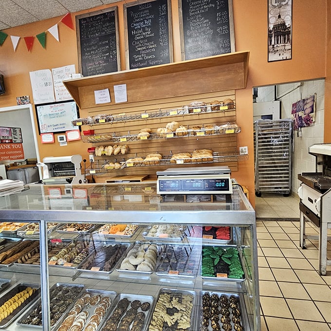 Where the magic happens—fresh-baked treasures lined up like soldiers, ready to march straight into your hungry embrace.