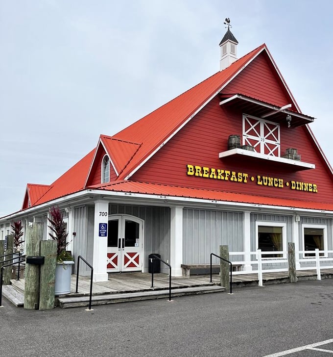 That red roof and weathered wood exterior isn't just country charm—it's a promise that authenticity awaits inside those barn doors.
