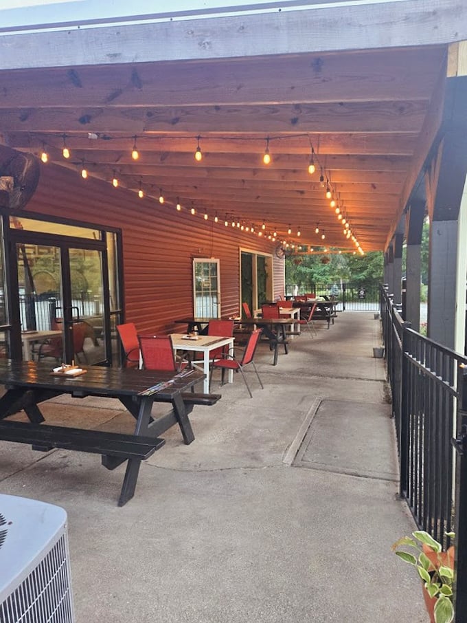 Outdoor dining under string lights—because barbecue tastes 20% better with a gentle breeze. Nature's dining room with a side of Ohio charm.