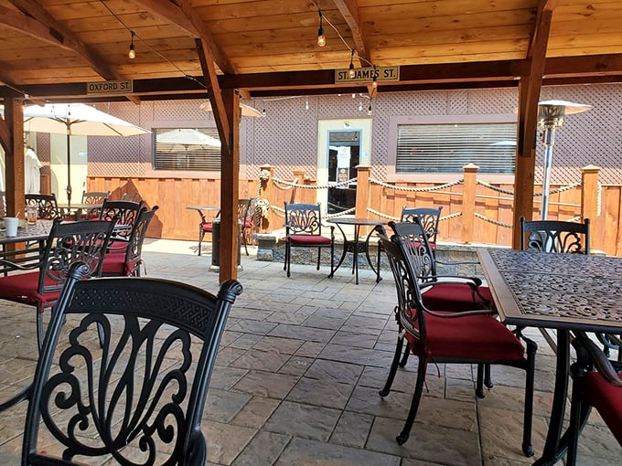 Outdoor dining under wooden beams offers fresh air with your fresh catch—the perfect setting for pretending you're at a seaside café.