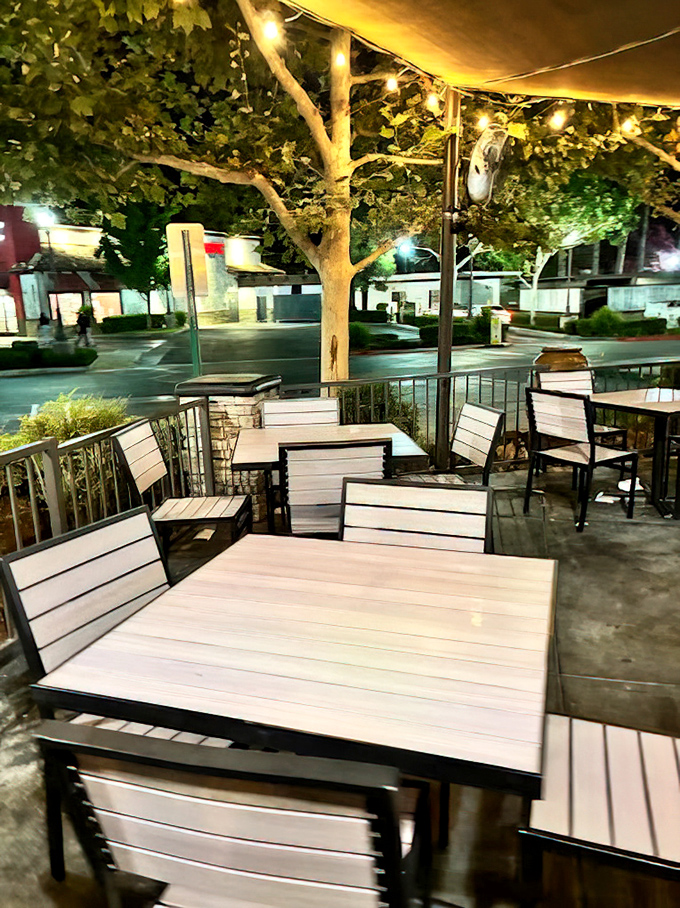 The outdoor patio, strung with lights, offers al fresco dining under the stars—because BBQ tastes even better with a gentle breeze.