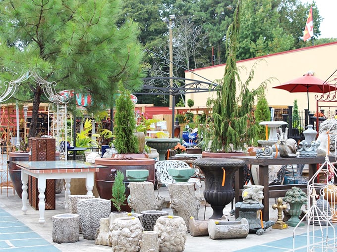 The outdoor garden section blooms with stone urns, concrete pedestals, and architectural elements that would make any landscape designer weak at the knees.