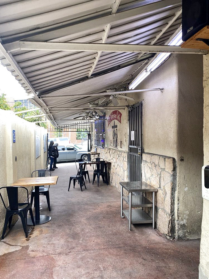 The outdoor seating area offers a moment of calm before the flavor storm that awaits inside – a casual prelude to serious eating.