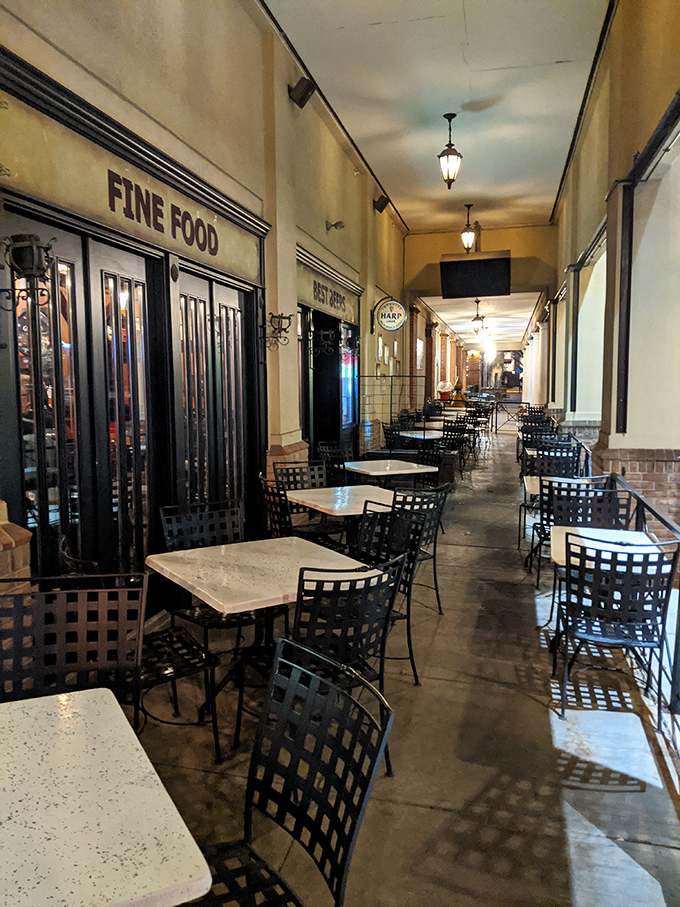 The outdoor seating corridor offers a perfect perch for people-watching while enjoying the pub's offerings in the open air.