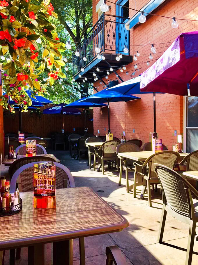 Outdoor seating that captures that magical French Quarter courtyard feeling. Those string lights aren't just illumination—they're tiny stars blessing your dining experience.