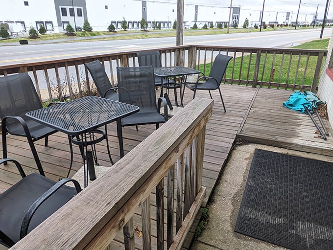 The humble deck seating offers fresh air with your fresh coffee. Sometimes the best conversations happen at these simple outdoor tables between bites of breakfast.