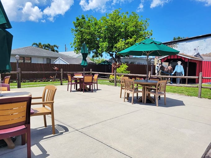 The outdoor seating area—where you can digest both pie and life decisions under Florida skies. Strategic umbrella placement is an art form.