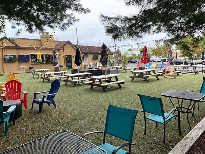 Outdoor picnic tables scattered across green space create an instant backyard party vibe. Perfect for those Pennsylvania days when sunshine feels like a personal gift.