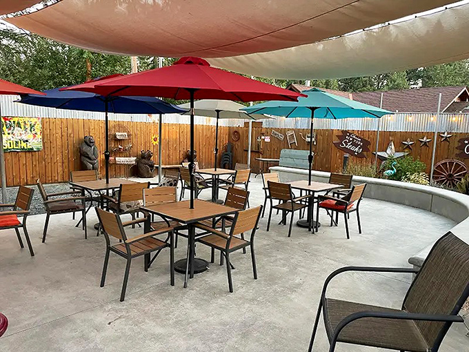 The outdoor patio—where Sierra mountain air seasons every bite. Summer evenings here make you wonder why you ever eat indoors.