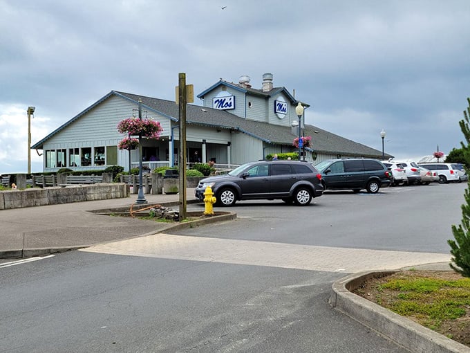 Even from the parking lot, Mo's promises ocean views and seafood treasures. Those hanging flower baskets aren't just pretty—they're a cheerful welcome to chowder paradise.