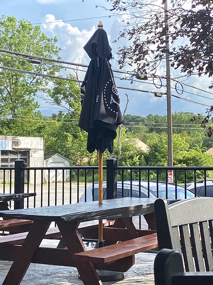 Outdoor tables bathed in golden hour light, where "just one more minute" turns into "let's order dessert" as the sun sets.