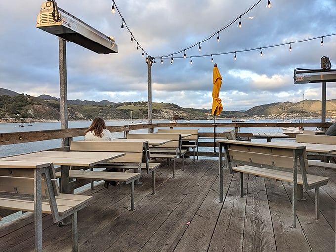 The patio offers front-row seats to nature's daily show, where sunsets compete with the food for your attention.