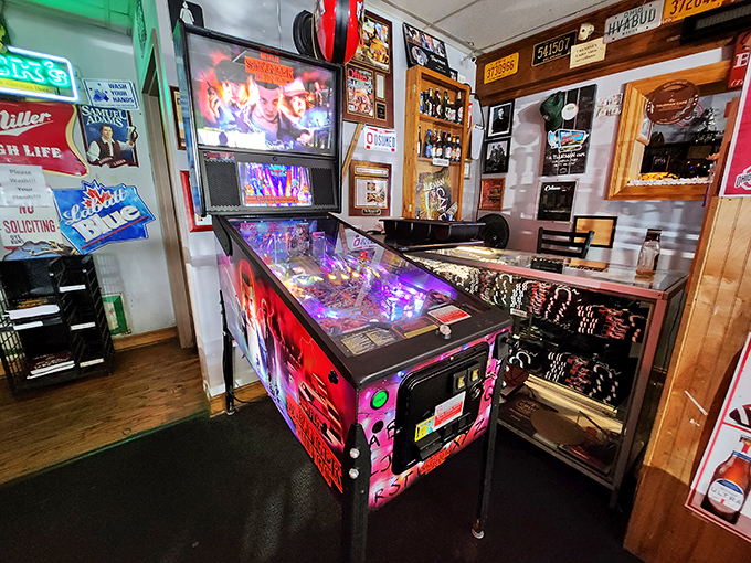 Even the pinball machine seems to understand its role in this temple of indulgence—providing entertainment while your stomach prepares for the main event.