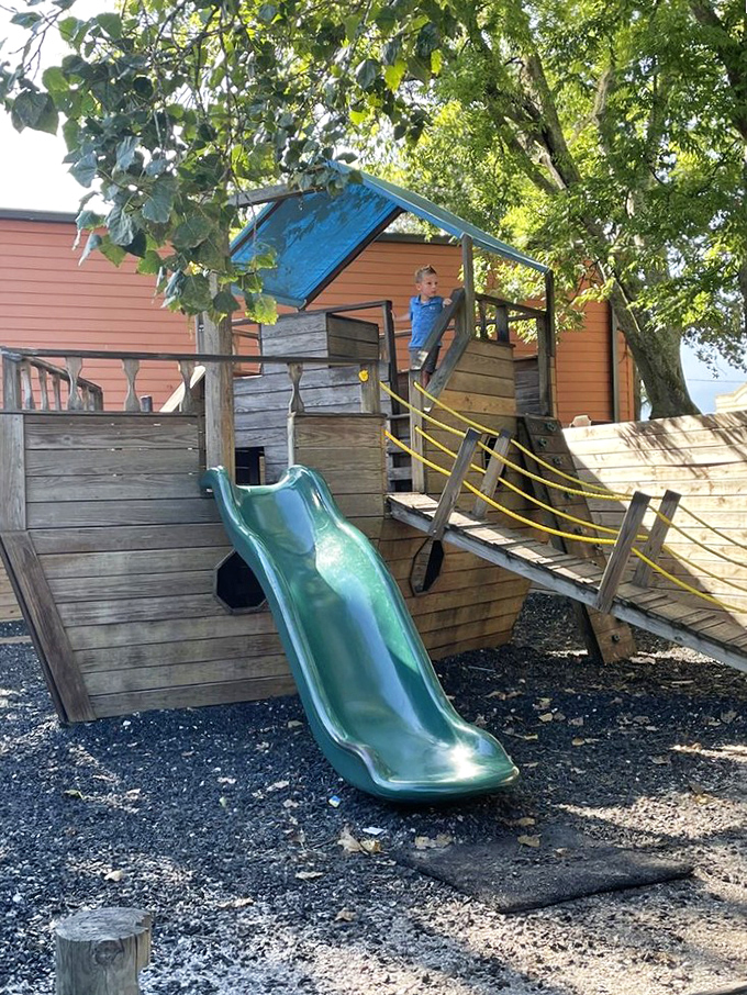 Even the kids get their slice of paradise. This nautical-themed playground keeps the little ones entertained while parents savor every last bite.