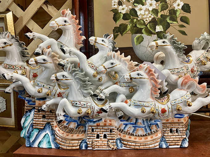 A porcelain stampede of decorative horses gallops across this display, each one more gloriously kitschy than the last.