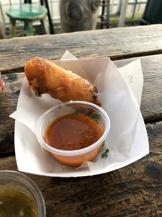 The potato log might be the unsung hero of the menu—crispy exterior, pillowy interior, and that dipping sauce that makes you consider drinking it straight.
