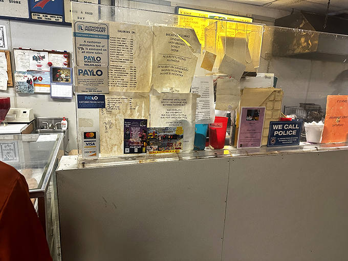 The wall of notices tells stories of neighborhood history. In an age of digital everything, this analog bulletin board feels refreshingly authentic.