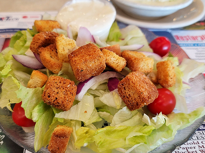 A garden salad that doesn't apologize for being exactly what it claims. Those croutons have been fraternizing with butter and nobody's complaining.