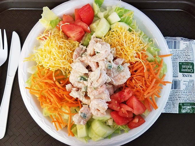A seafood salad that proves healthy eating doesn't mean sacrificing flavor. Fresh shrimp nestled among vibrant vegetables—Neptune's garden on a plate.