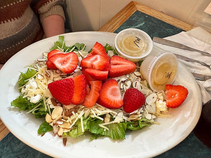A strawberry salad that doesn't just nod to healthy eating—it gives it a bear hug while looking absolutely gorgeous.