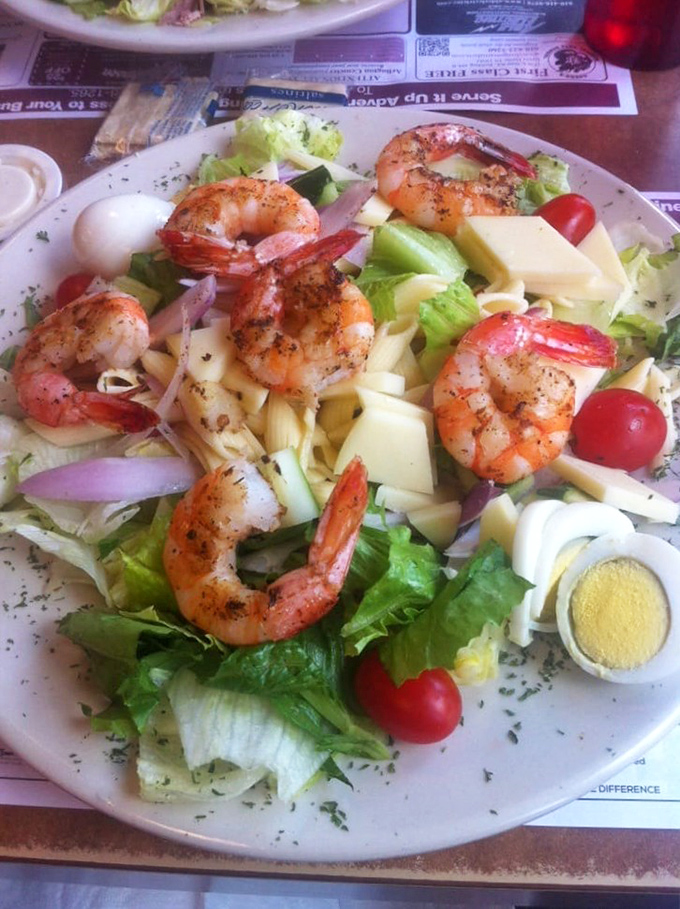 A shrimp salad that doesn't skimp on the shrimp. This isn't some sad desk lunch – it's a vacation for your taste buds in the middle of an ordinary day.