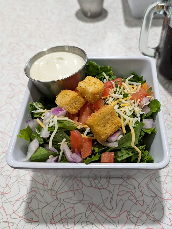 Fresh salads prove this kitchen handles lighter fare with the same attention to detail.