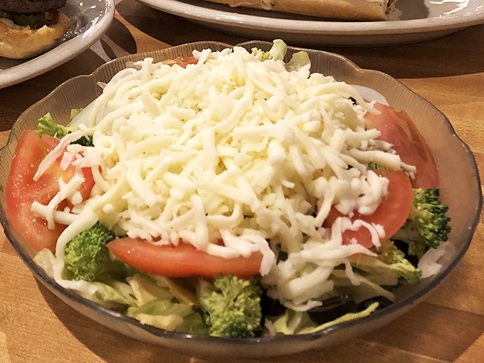 A salad so fresh and cheese-laden it almost—almost—makes you forget you came for pizza. The perfect guilt-reducer before dessert.