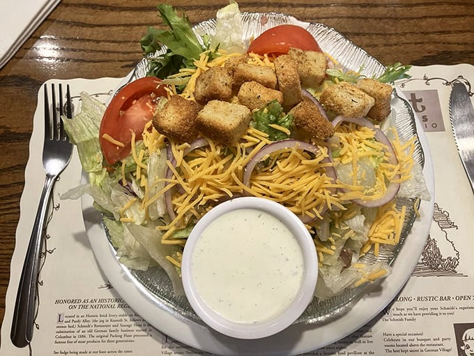 A salad that doesn't apologize for being a salad—loaded with cheese, croutons, and enough toppings to make you temporarily forget about the schnitzel you ordered.