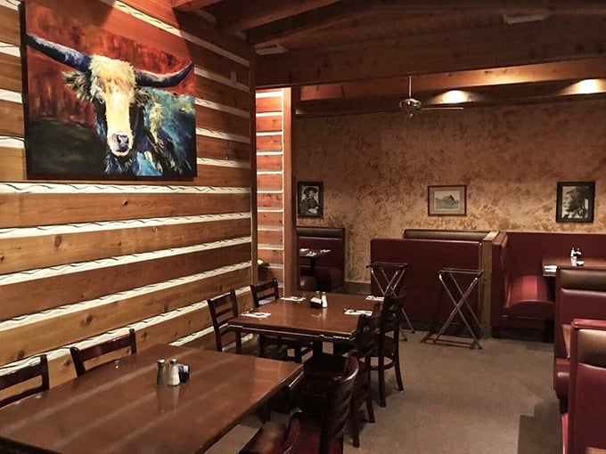Rustic wooden walls, comfortable booths, and that magnificent longhorn painting create the perfect backdrop for making important food decisions.