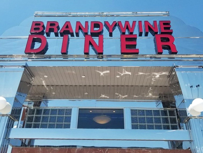 The sign that's launched a thousand breakfast runs—those red letters spelling out hope for hungry Wilmington residents since day one.