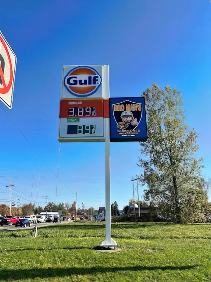 The Gulf sign with the Bro Man's banner—a beacon of hope for hungry travelers and locals alike. Follow it to flavor country.