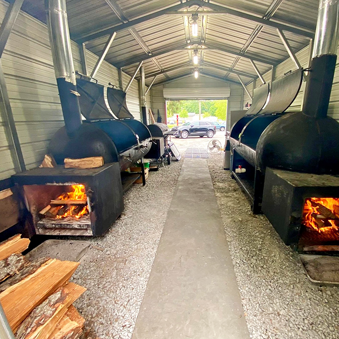 The holy grail for BBQ enthusiasts—a glimpse into the smoker sanctuary where magic happens. Those glowing fires are transforming tough cuts into treasures.