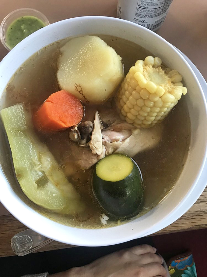 Caldo de pollo – chicken soup that could heal anything from a cold to a broken heart. Those vegetables aren't just floating; they're dancing.